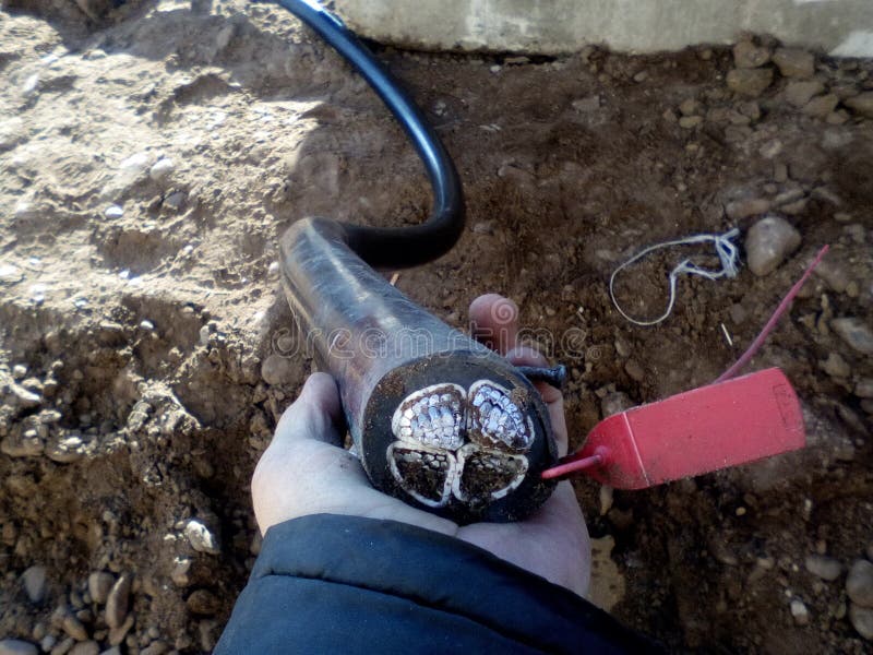 Laying of Power Cable in the Trench To the User Stock Photo - Image of ...