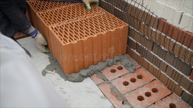 Laying Red Ceramic Blocks at a Construction Site. CERAMIC BLOCKS for ...