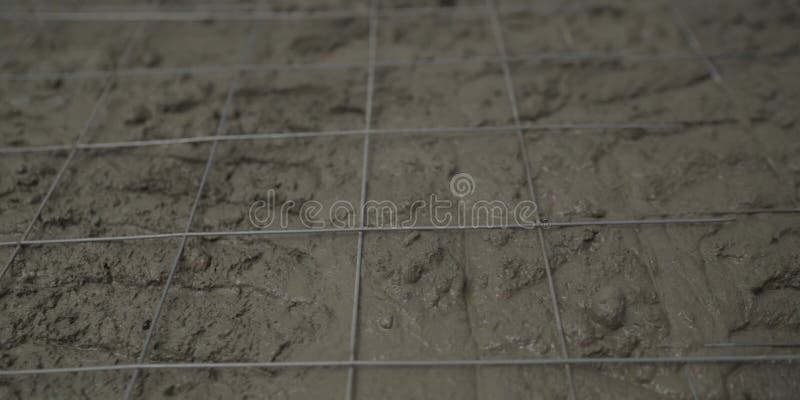 Laying Reinforcing Mesh on the Solution. Metal Mesh for Floor Repair ...