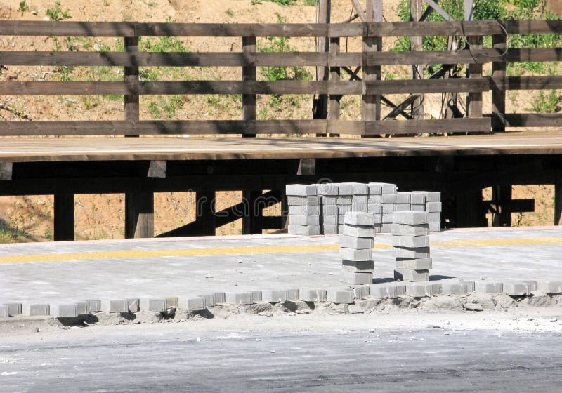 Laying of Road Tiles, Construction of Railway Platform Stock Photo ...