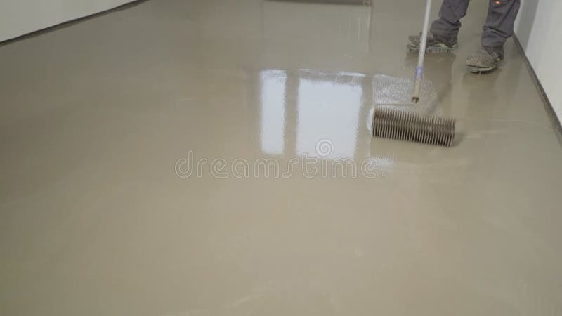 Bulk Floor Close-up. the Process of Laying a Self-leveling Floor. Air ...