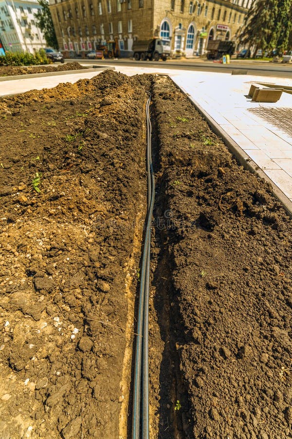 Laying a Trench for the Cable Stock Photo - Image of earth, summer ...