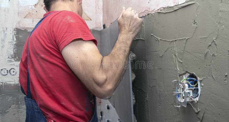 Installing Ceramic Wall Tiles with Tile Levelers Stock Photo - Image of ...