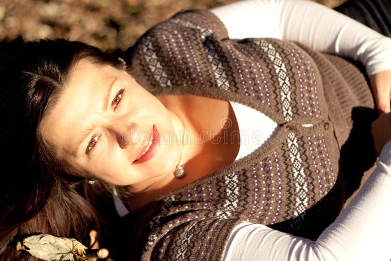 Laying woman stock image. Image of outdoor, leaves, eyes - 21603203