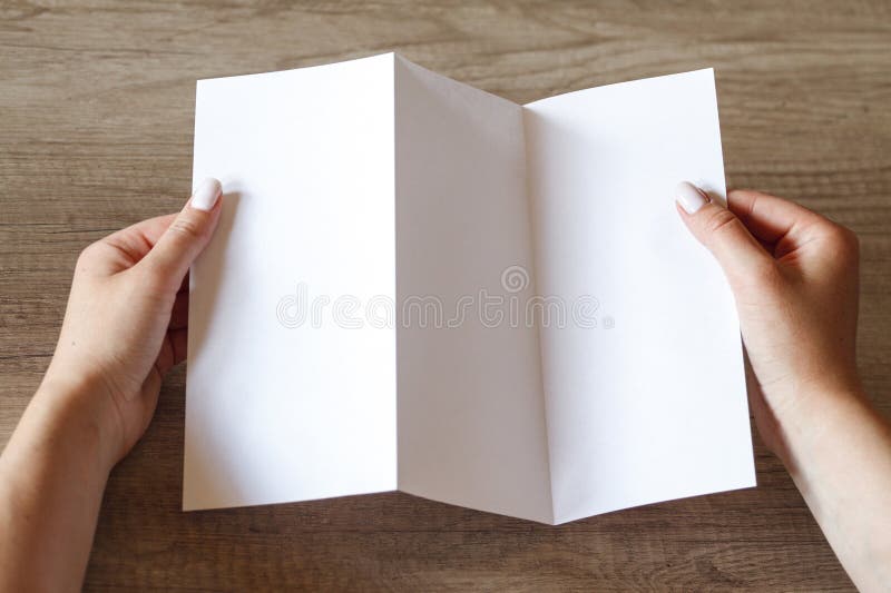 The Layout of the Booklet in the Hands Stock Image - Image of ...