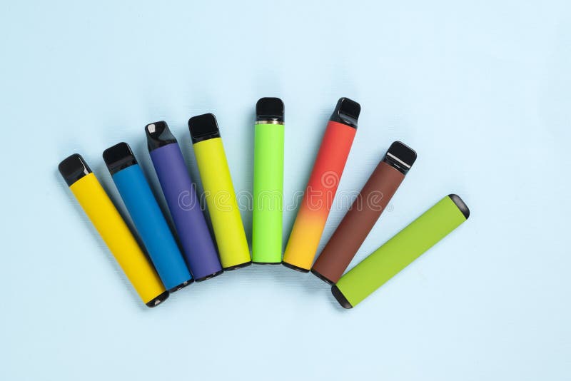 Layout of Colorful Disposable Electronic Cigarettes with Shadows on a ...