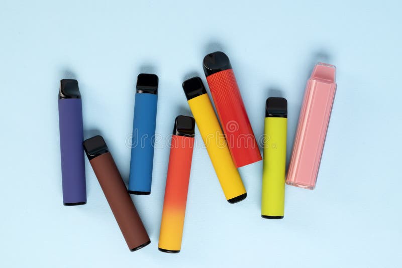 Layout of Colorful Disposable Electronic Cigarettes with Shadows on a ...