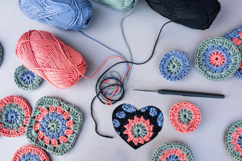 Layout of Crochet Patterns, a Hook, a Heart and Yarns Around on Grey ...