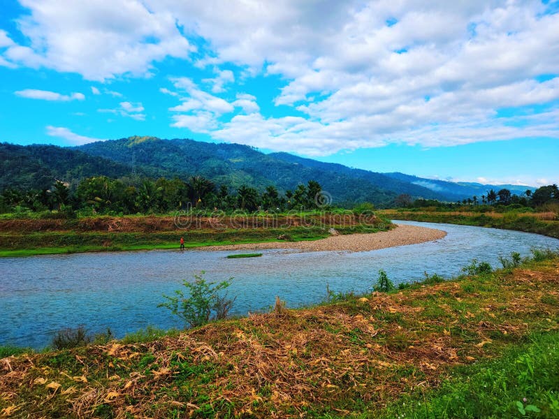 Layout. a Large River that Flows Calmly in the Middle of the Indonesian ...