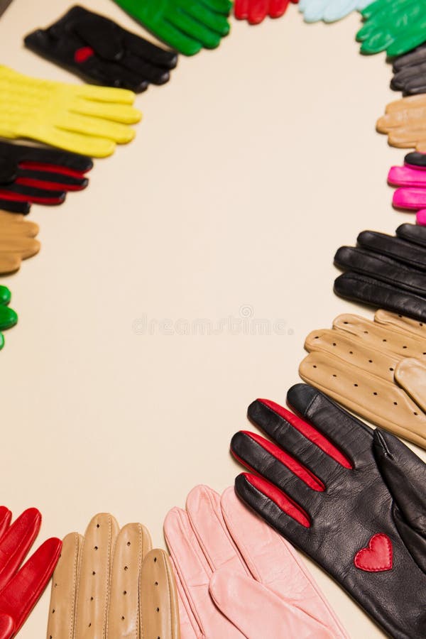 Layout of Multi-colored Gloves on a Beige Background Stock Image ...