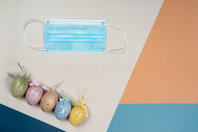 Layout on a White Background, Easter Eggs and a Medical Mask. Concept ...
