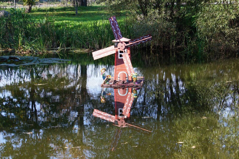 The Layout of a Windmill on a Pond Stock Photo - Image of pond, built ...