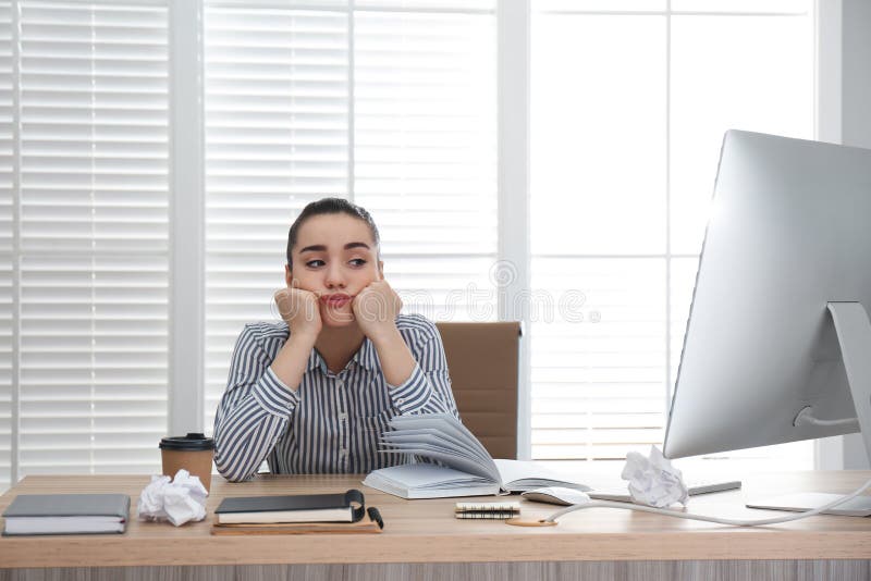 Lazy Employee Wasting Time at Table in Office Stock Photo - Image of ...