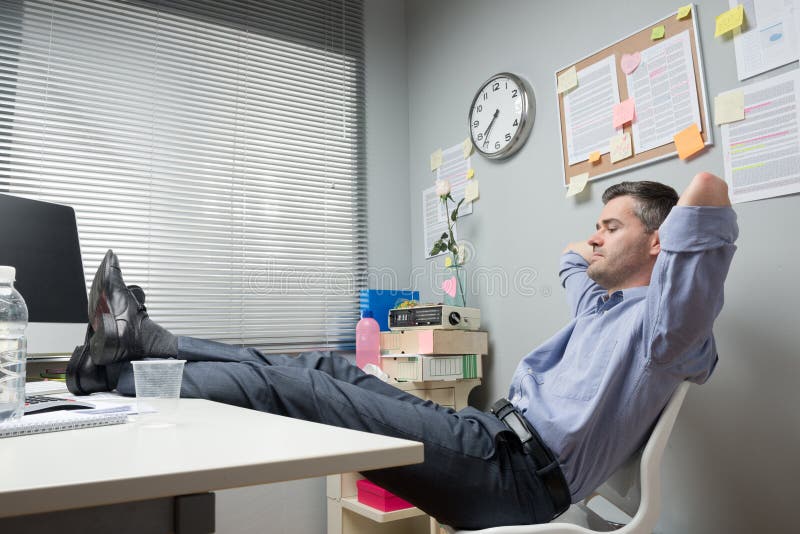 Lazy office worker feet up stock photo. Image of legs - 46523616