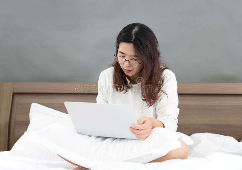 Lazy Oriental Girl Working from Home Stock Image - Image of glasses ...