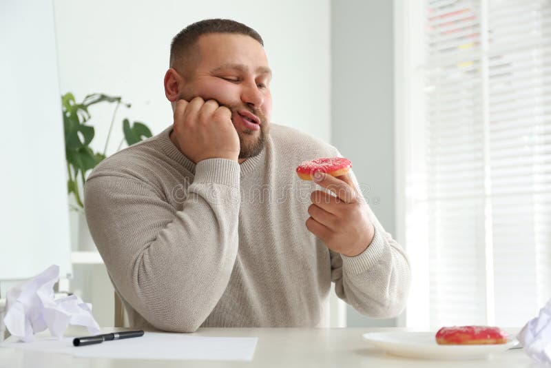 Lazy Overweight Man with Donuts Watching TV on Sofa Stock Photo - Image ... Lazy Overweight Man with Donuts Watching TV on Sofa Stock Photo - Image ...