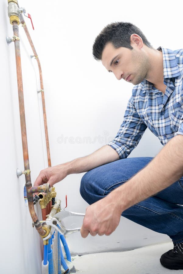 Lazy plumber at work stock image. Image of disinterested - 271108343