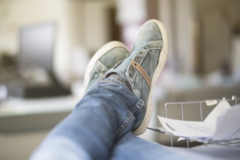 Lazy worker at office rest stock image. Image of shoes - 185751821