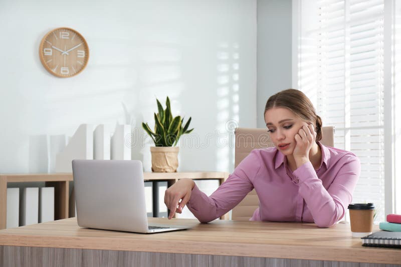 Lazy worker at wooden desk stock image. Image of relax - 182229019