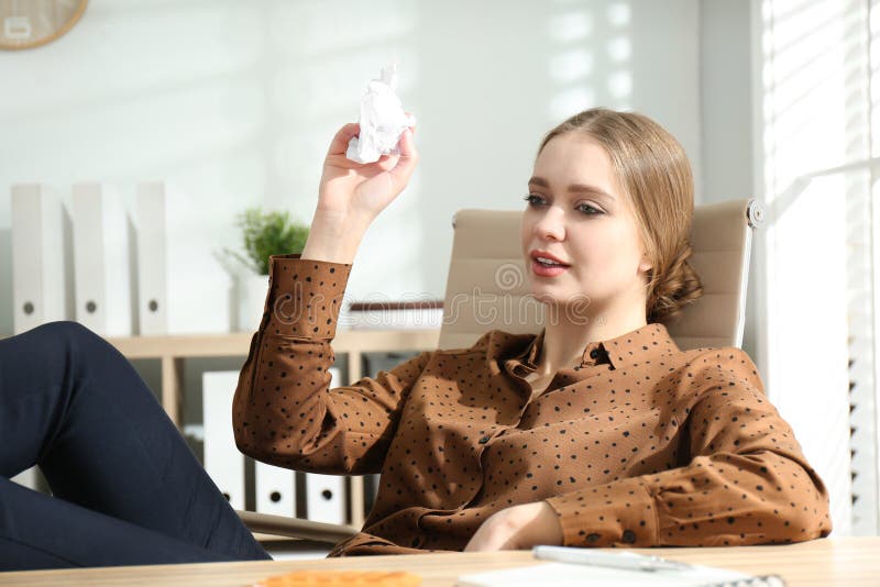 Lazy worker at wooden desk stock photo. Image of room - 182229018