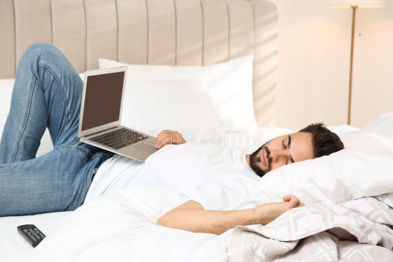 Lazy Man with Laptop, Smartphone and Bowl of Chips Lying on Floor at ...