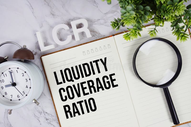 LCR- LIQUIDITY COVERAGE RATIO Word on a Yellow Sticky with Calculator ...