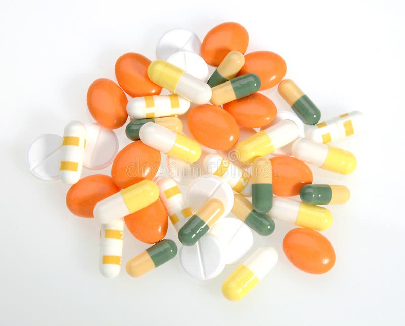 La Vista Superiore Delle Pillole Gialle Ha Straripato Una Bottiglia ...
