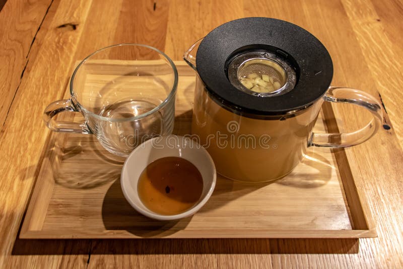 The Leaching of Ginger Tea in a Jug with Filter on a Table Stock Image ...