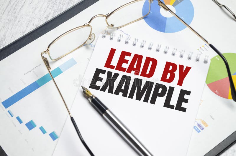 Lead by Example. Office Table Desk with Supplies, White Blank Note Pad ...