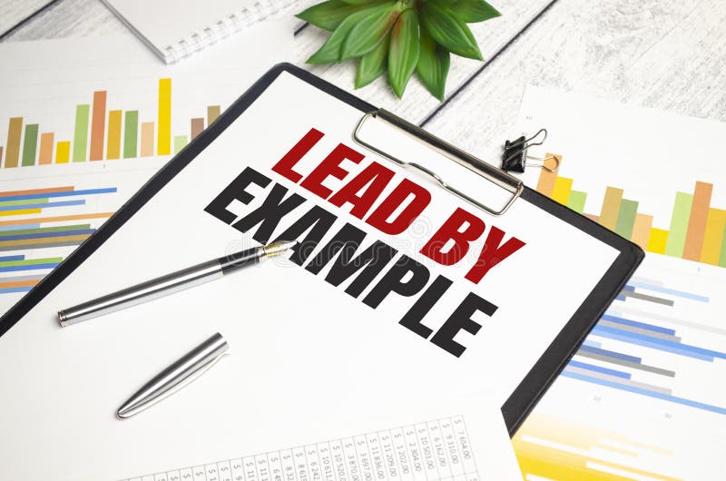 Lead by Example. Text on Notepad on Wood Table Stock Image - Image of ...