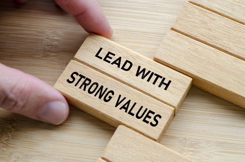Lead with Strong Values Phrase on Stacked Wooden Blocks, Emphasizing ...