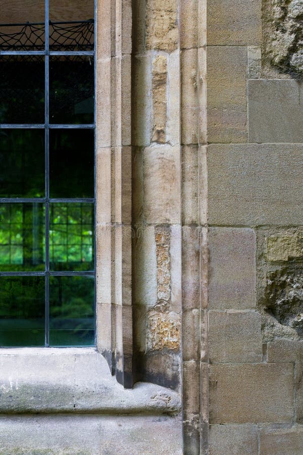 Leaded Glass Window in Limestone Wall Stock Photo - Image of gardens ...
