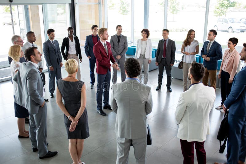 Leader Standing in Front of His Successful Business Team Stock Photo ...