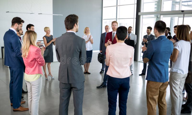 Leader Standing in Front of His Successful Business Team Stock Photo ...