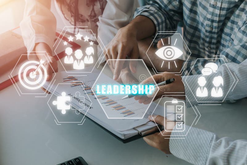 Business Team Analyzing Income Charts on Office Desk with Leadership ...