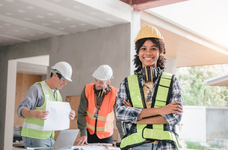 Leadership Concept by Female Engineers : Portrait of a Happy Female ...