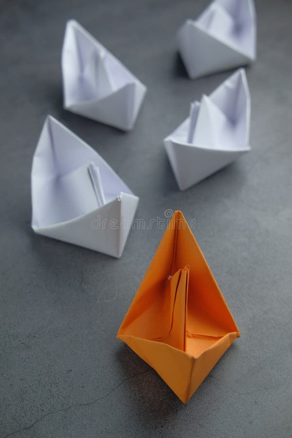 Leadership Concept Using Orange Paper Ship among White. Stock Photo ...