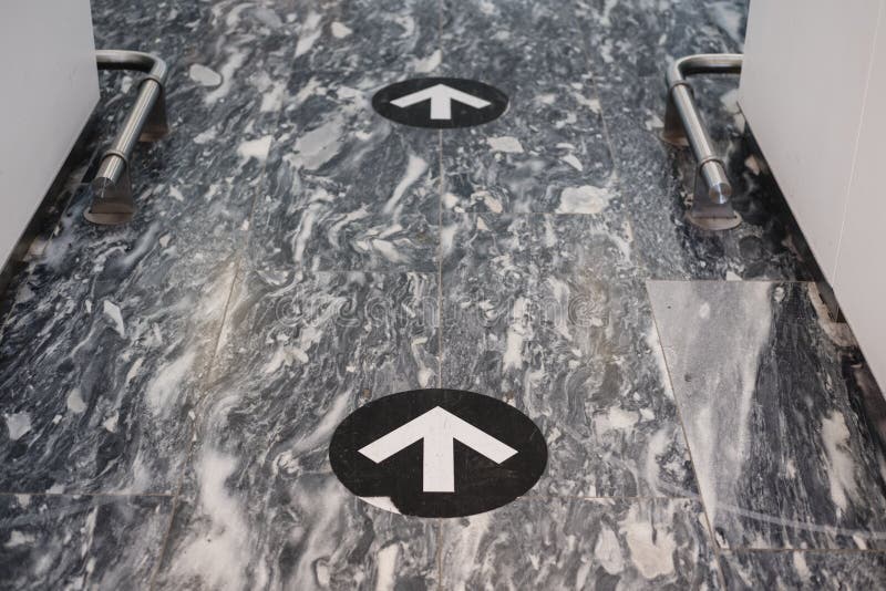 Leading Arrows Sign on the Floor Stock Image - Image of idea, pass ...
