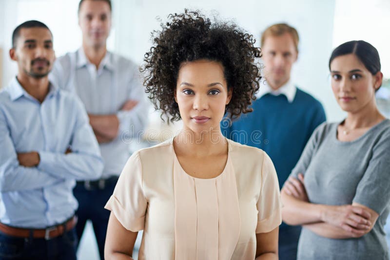 Leading by Example. Portrait of a Group of Diverse Colleagues Standing ...