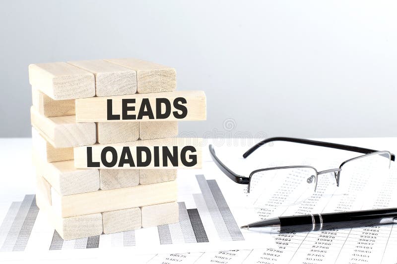 LEADS LOADING is Written on Wooden Blocks on a Chart Background Stock ...