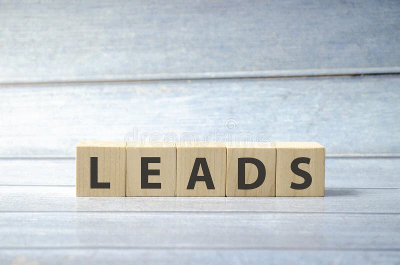 Leads Sign in a Bright Office Environment Stock Image - Image of letter ...