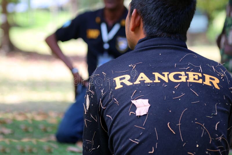 Leaf Debris on the Shirt of Park Ranger. Editorial Image - Image of ...