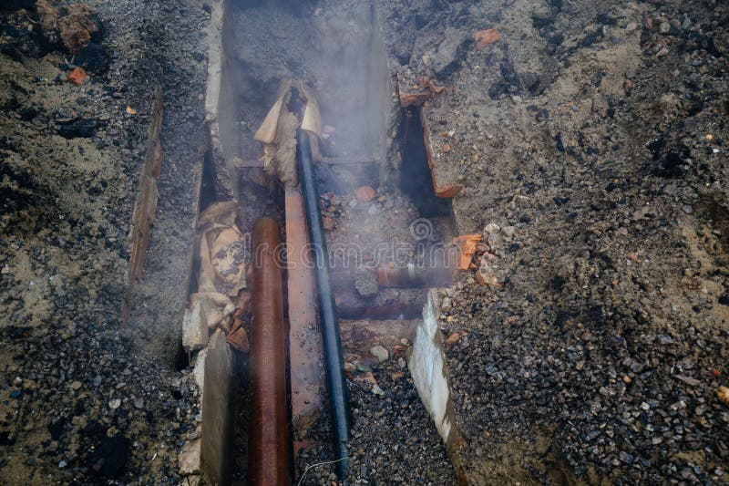 Leak of Water in Broken Old Rusty Pipes of the Heating System Stock ...