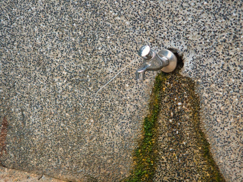 Leaking Faucet on Stone Wall Stock Photo - Image of neglected, leaks ... Leaking Faucet on Stone Wall Stock Photo - Image of neglected, leaks ...