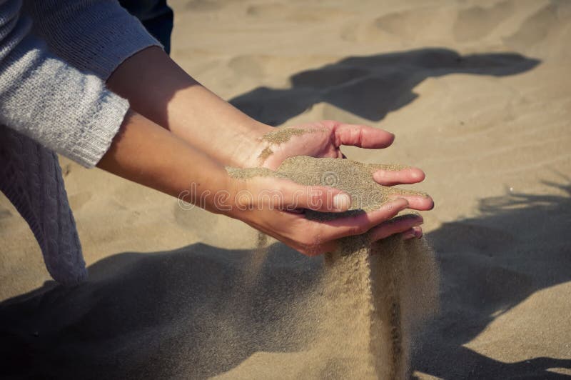 Sand strewed from a fist stock photo. Image of sprinkle - 38369786