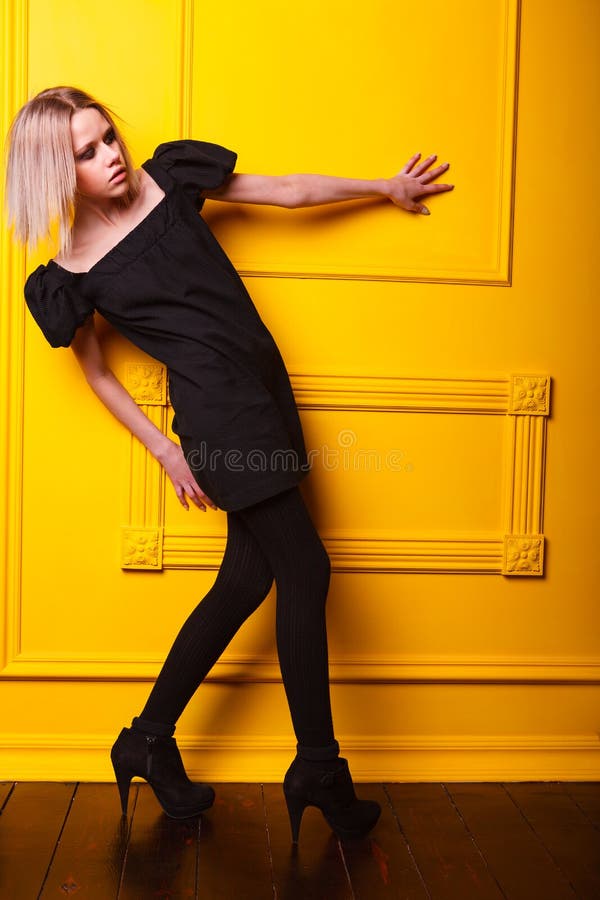Lean Girl Posing on Yellow Background Stock Image - Image of hair ...