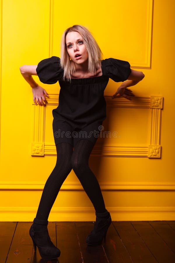 Lean Girl Posing on Yellow Background Stock Image - Image of looking ...