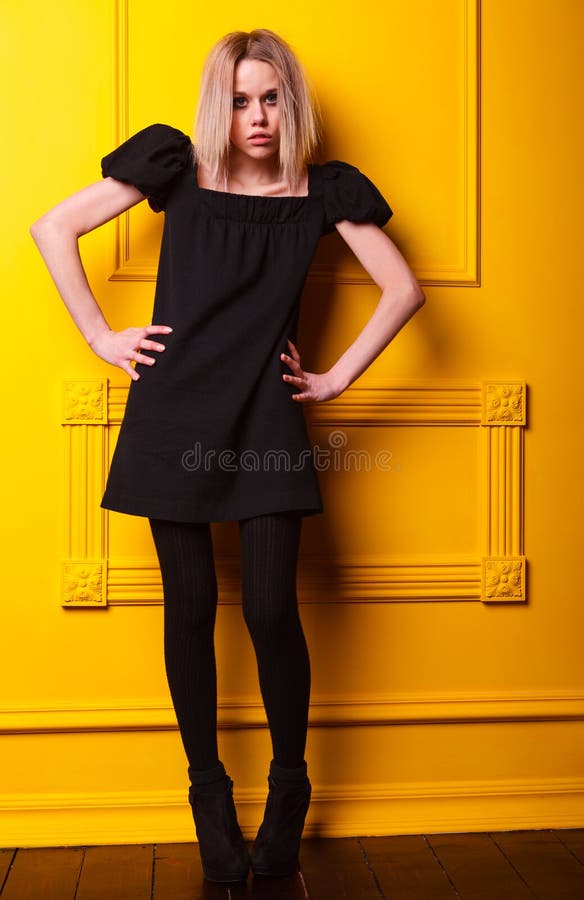 Lean Girl Posing on Yellow Background Stock Image - Image of looking ...