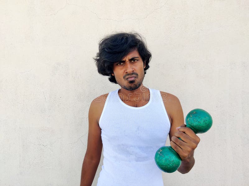 Lean Indian Man in White Workout Clothes Stock Photo - Image of ...