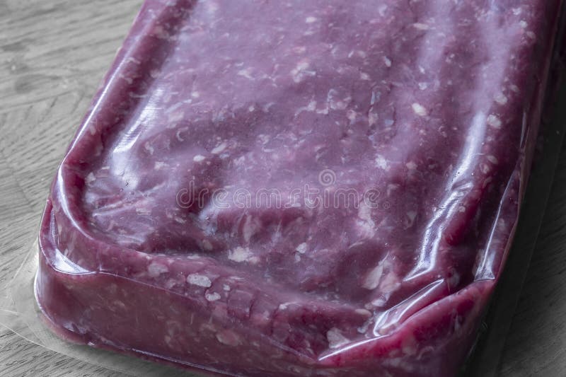 Lean Minced Beef Sealed in a Vacuum Packed Plastic Wrap. Stock Photo ...